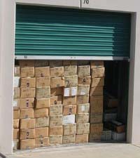 Boxes right behind the door can get wet if not careful with washing.